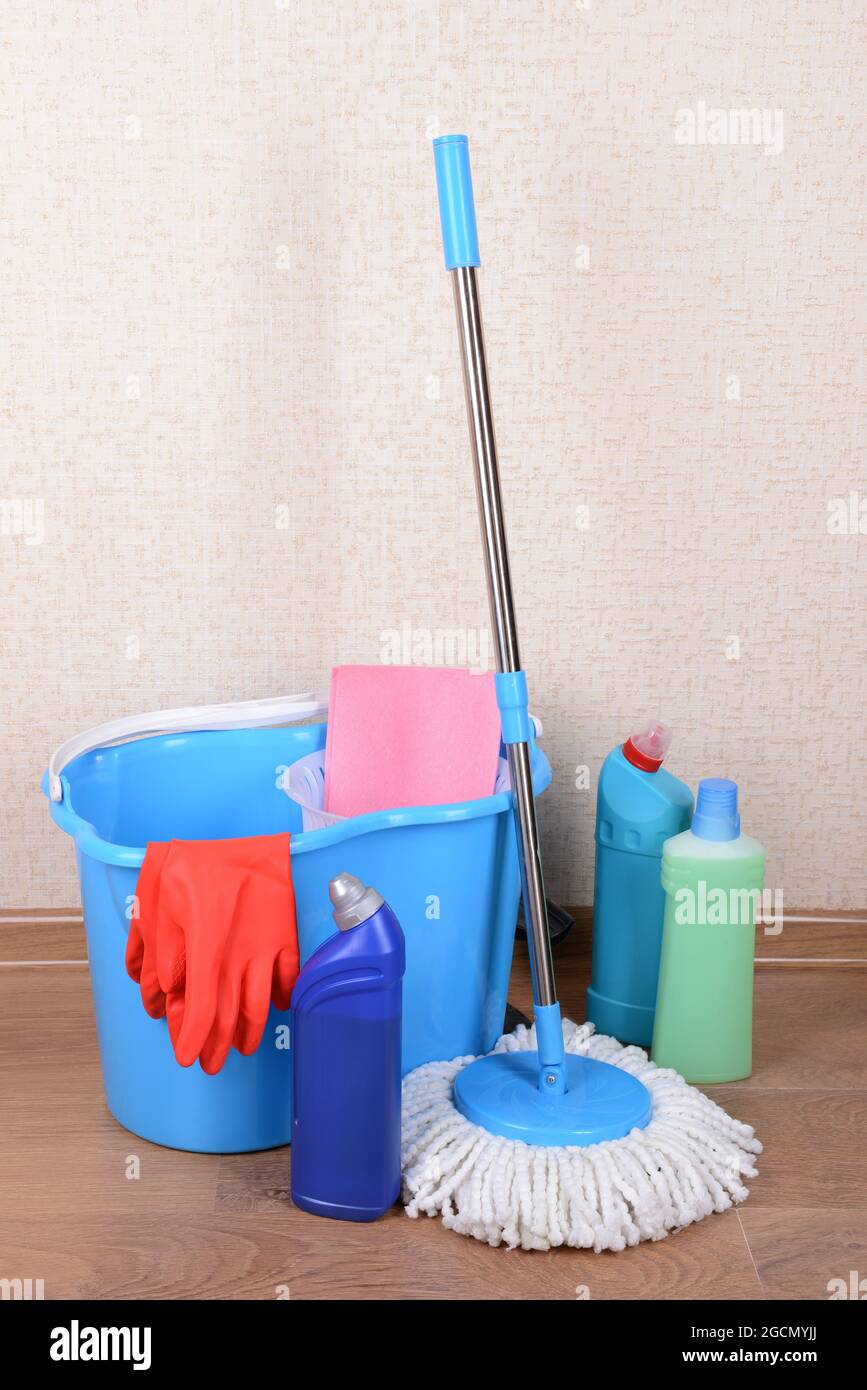 Different tools for cleaning floor in room Stock Photo - Alamy