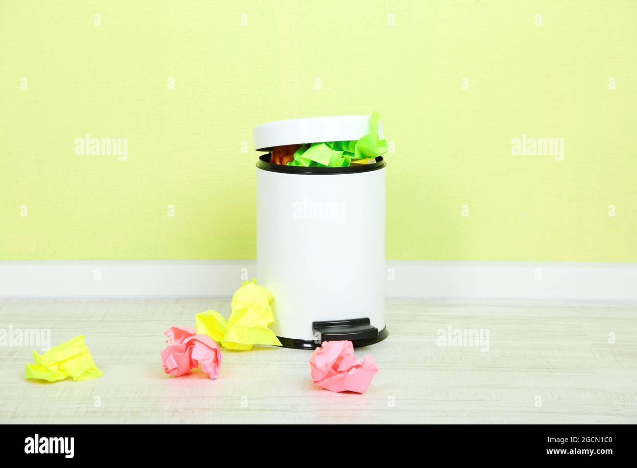 Garbage bin, on green background Stock Photo - Alamy