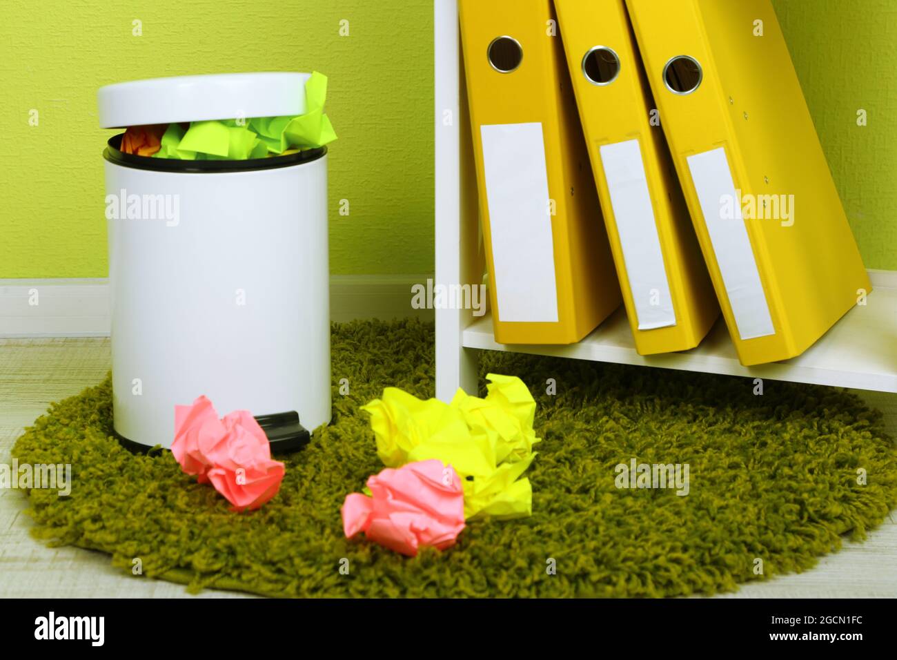 Garbage bin, on office background Stock Photo - Alamy