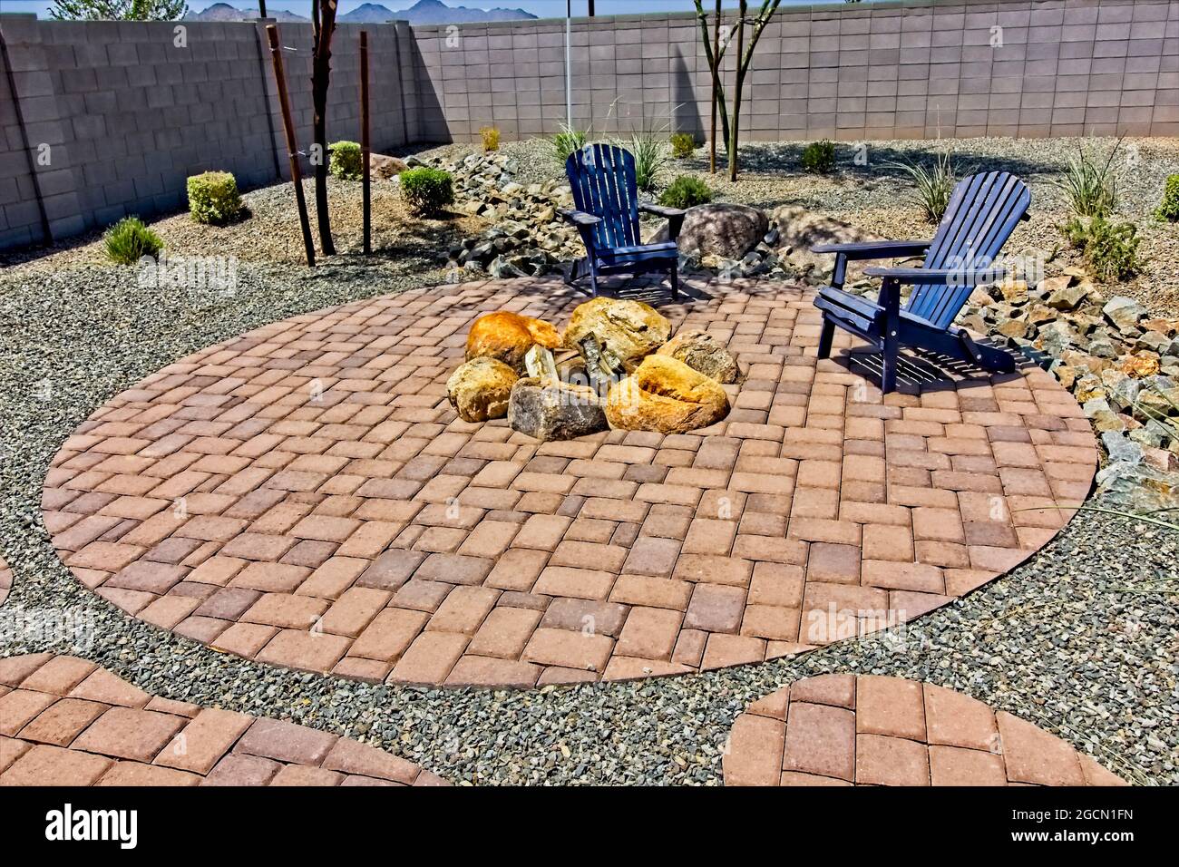 Conversation Area With Two Arm Chairs And Fire Pit On Pavers Stock ...