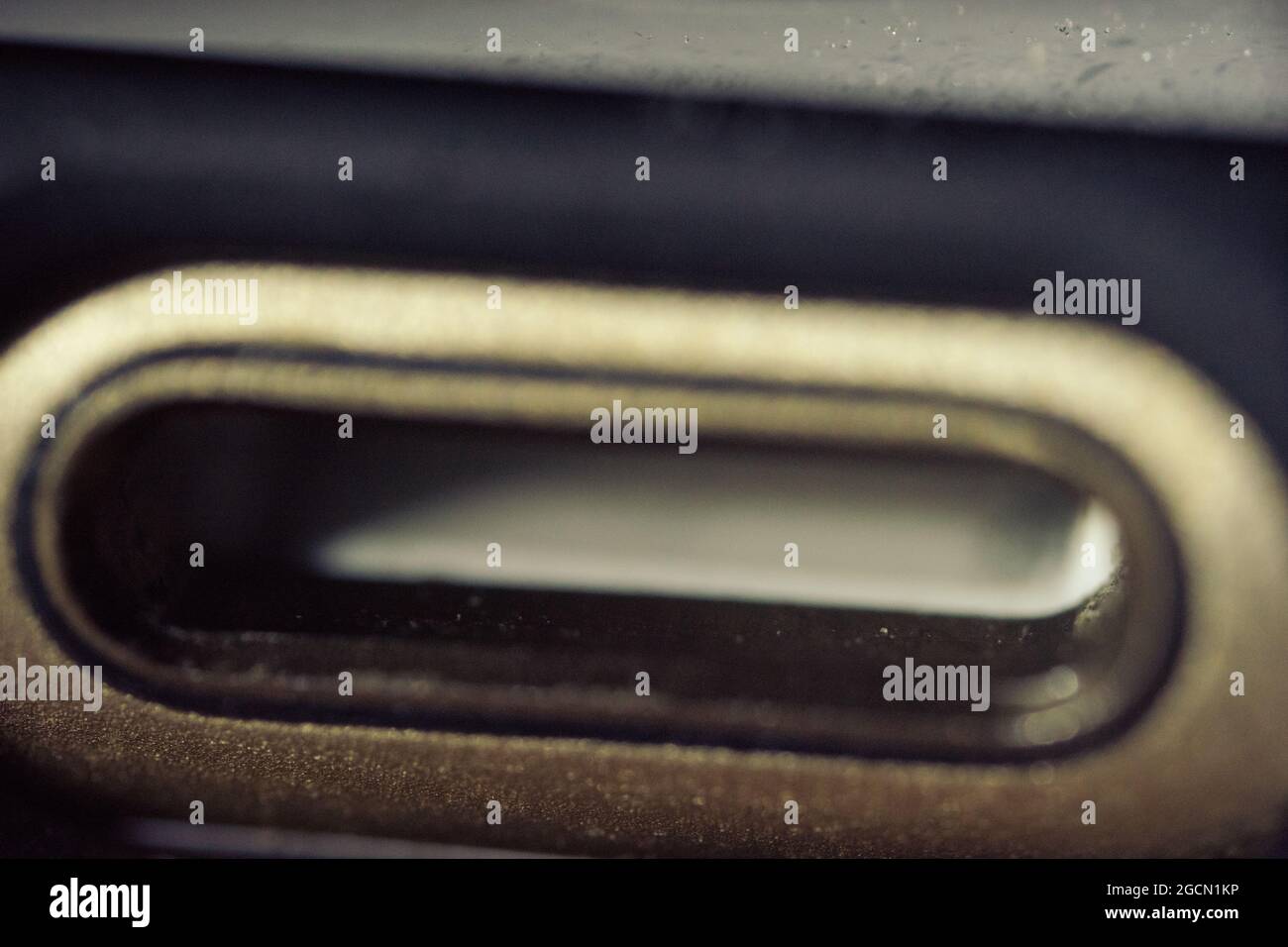 Macro shot of a blurry USB Type-C hole Stock Photo - Alamy
