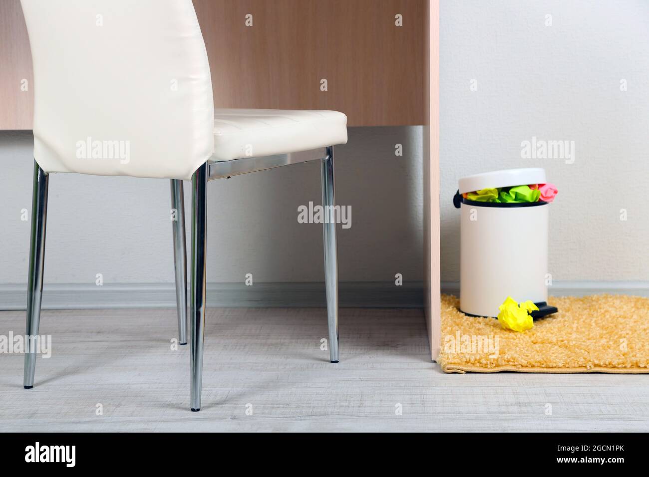 Garbage bin, on office background Stock Photo - Alamy