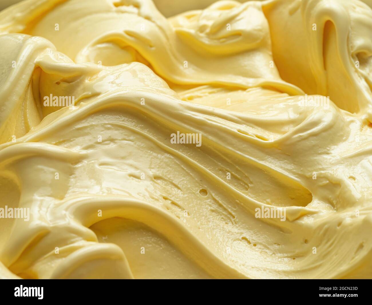 Vanila flavour gelato - full frame detail. Close up of a beige surface ...