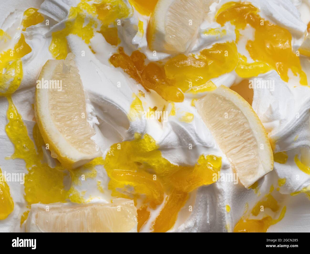 Frozen Lemon flavour gelato - full frame detail. Close up of a white ...