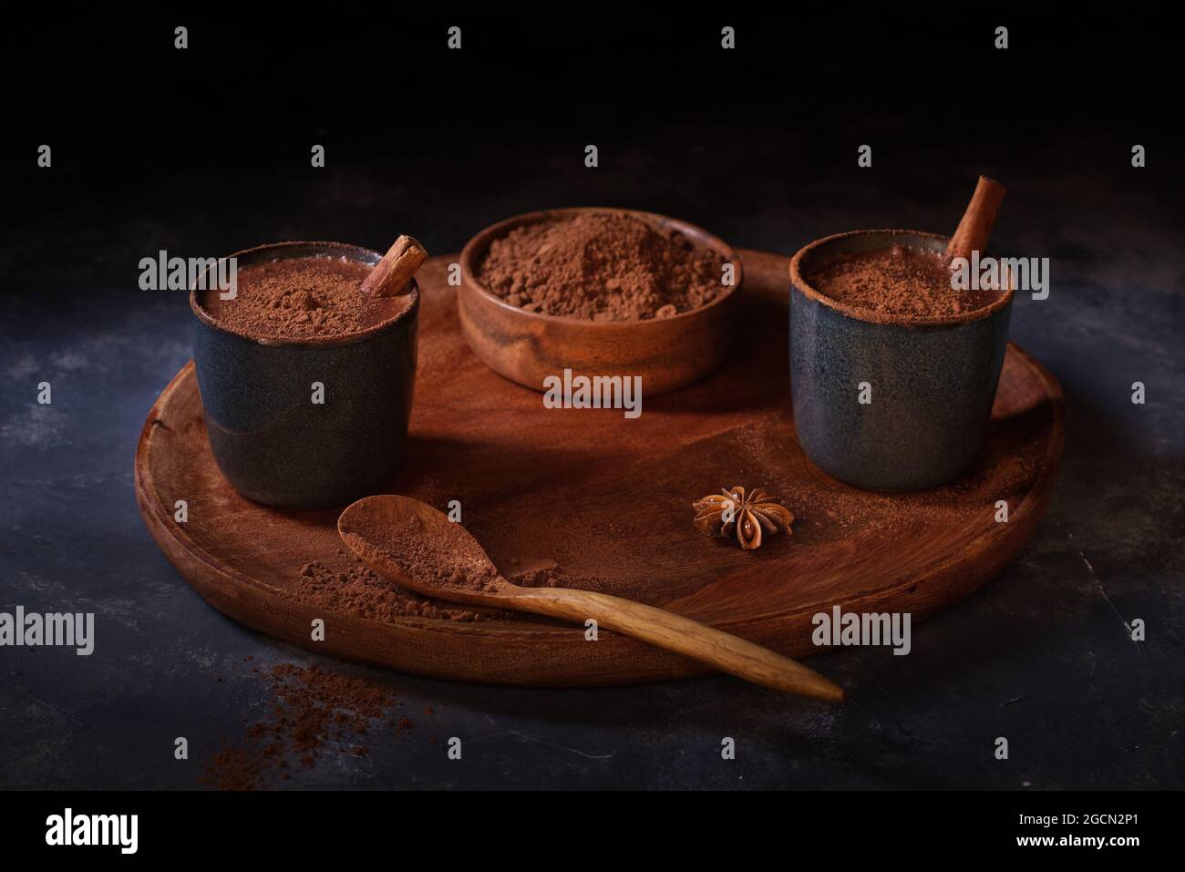 Making hot cocoa drink from real coca powder. Tasty healthy drink for ...