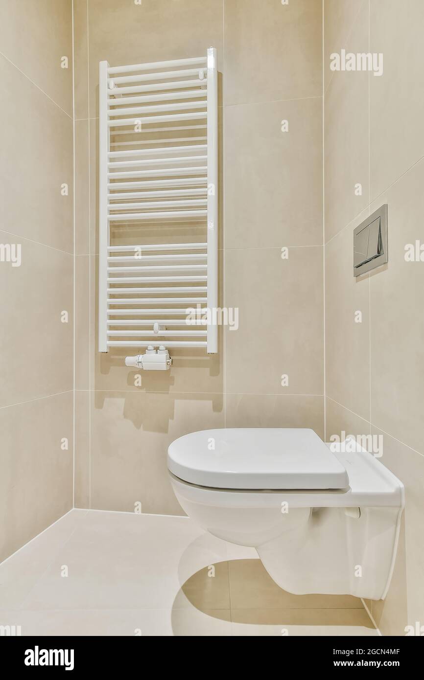 Interior of small clean washroom in miniature style Stock Photo - Alamy
