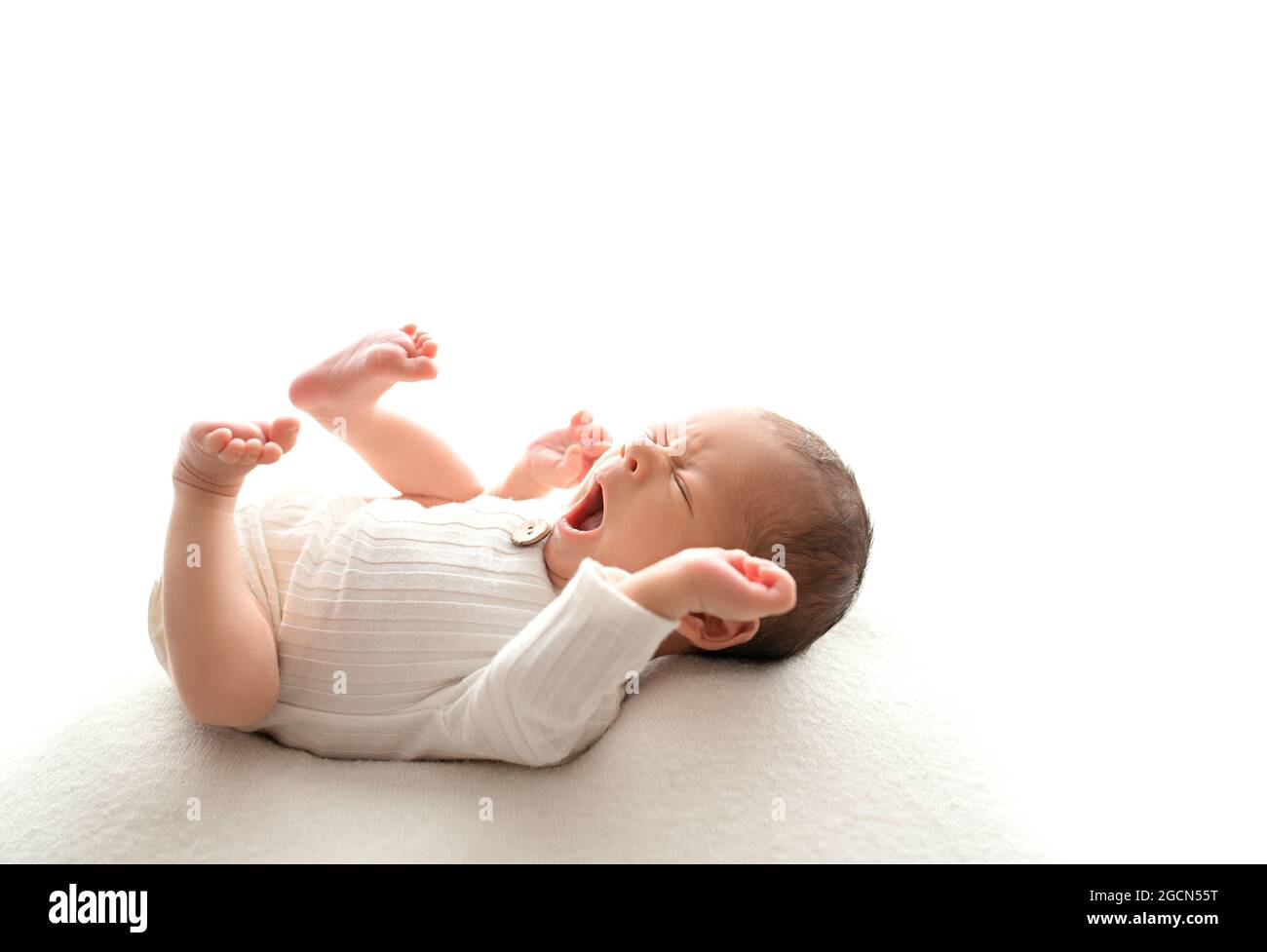 Newborn baby, white background, soft focus Stock Photo - Alamy