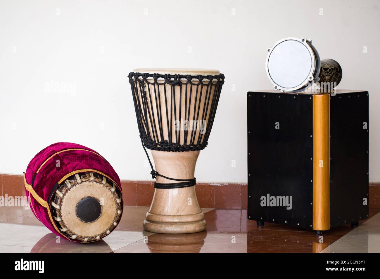 Closeup shot of a cagon box and bongo instruments Stock Photo - Alamy