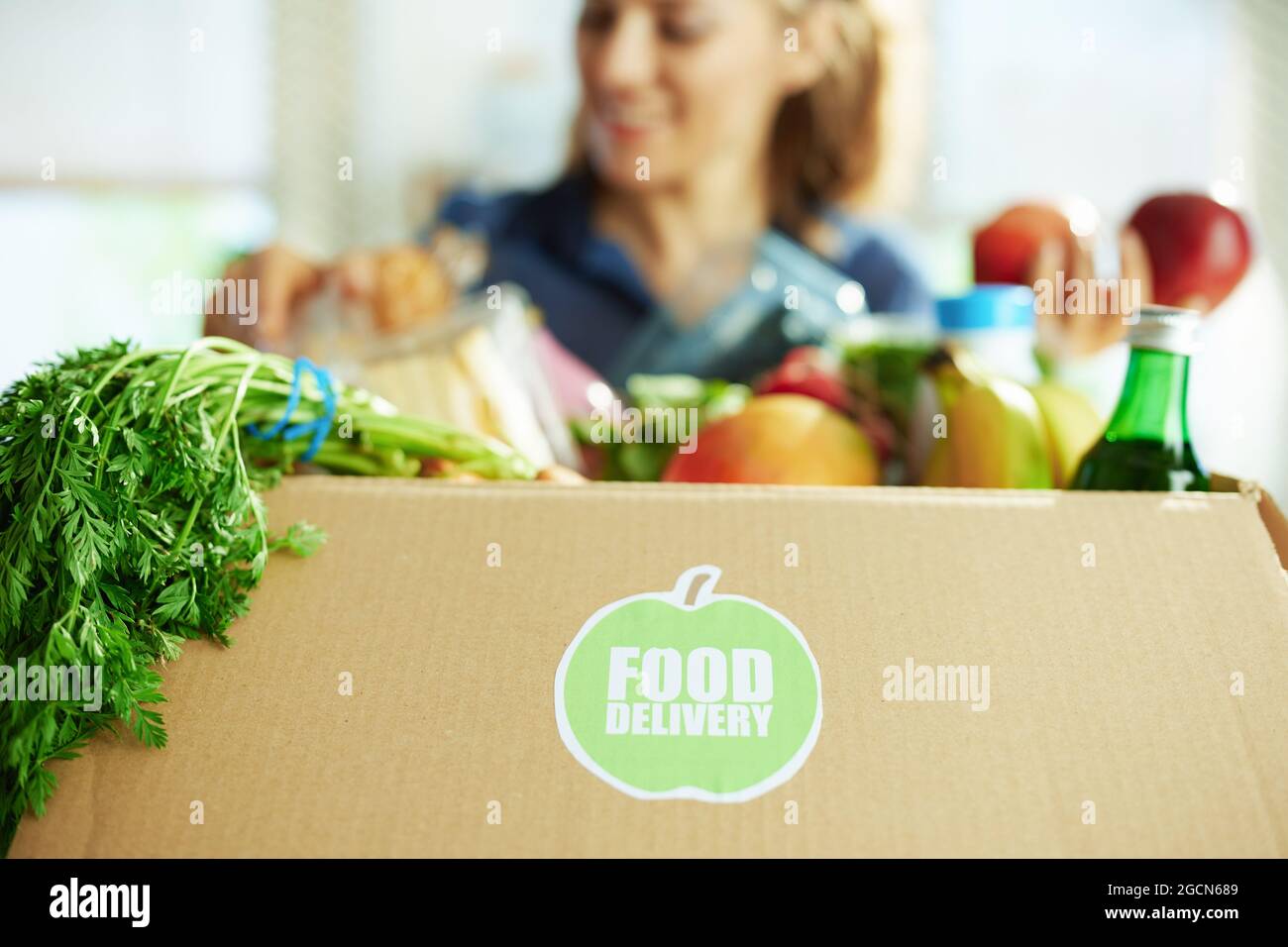 Woman delivering meal at hi-res stock photography and images - Alamy
