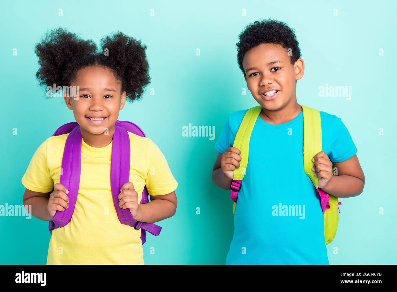 Portrait of two nice cheerful friends friendship going back to primary ...