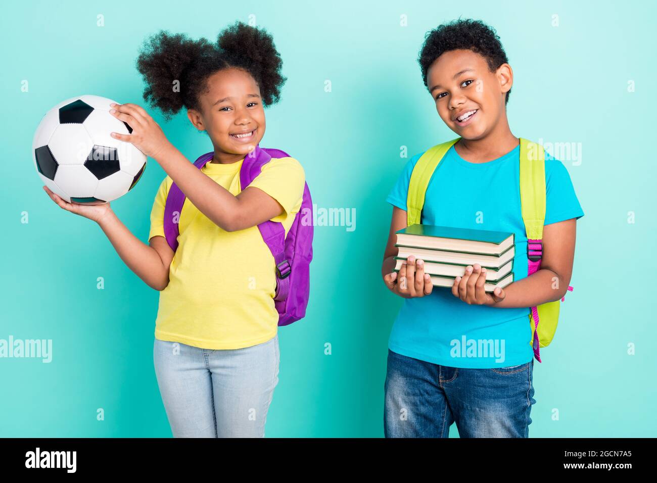 Portrait of two nice cheerful friends friendship studying having fun ...