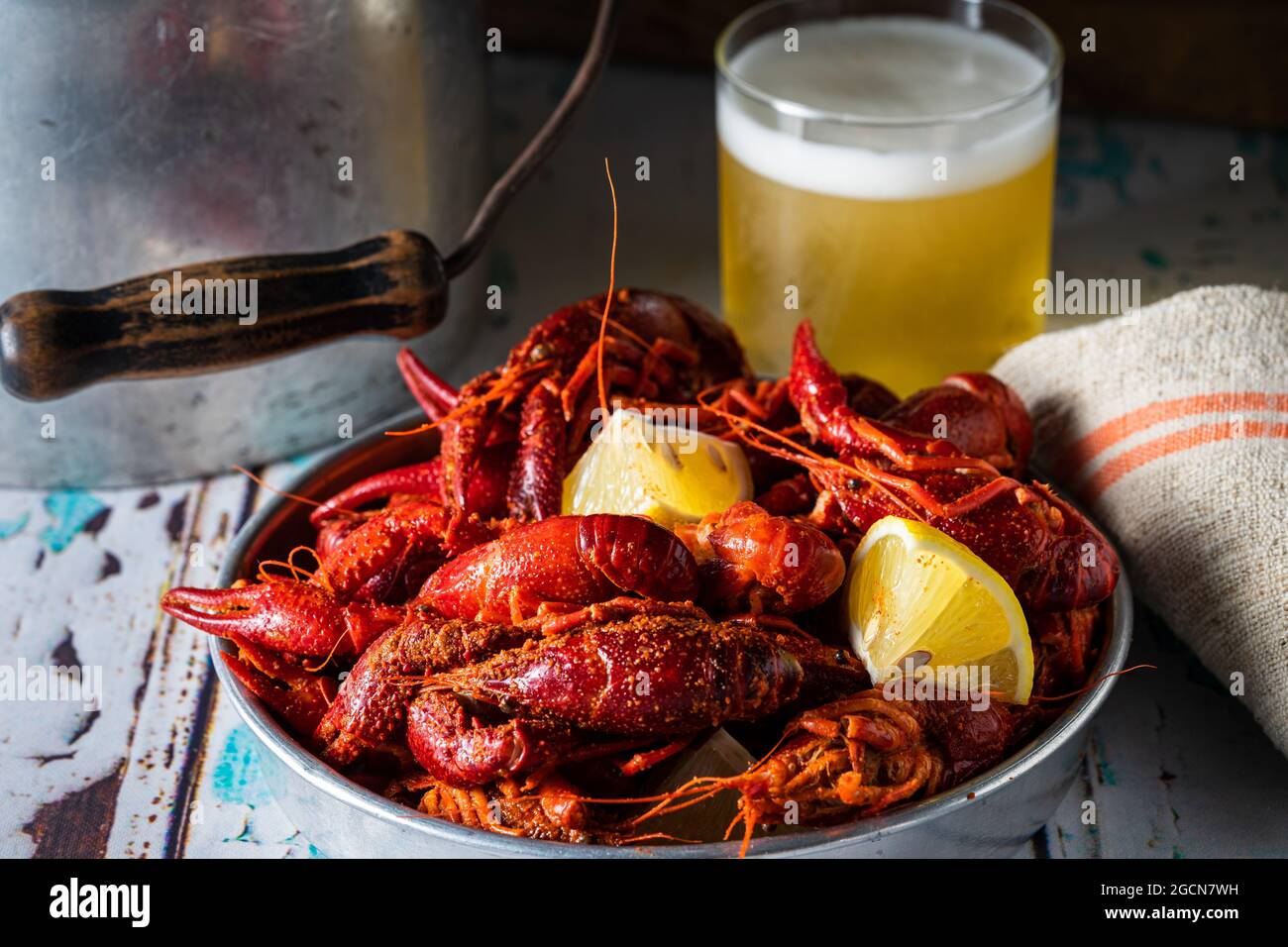 Steamed crawfish with grilled corn and beer Stock Photo - Alamy