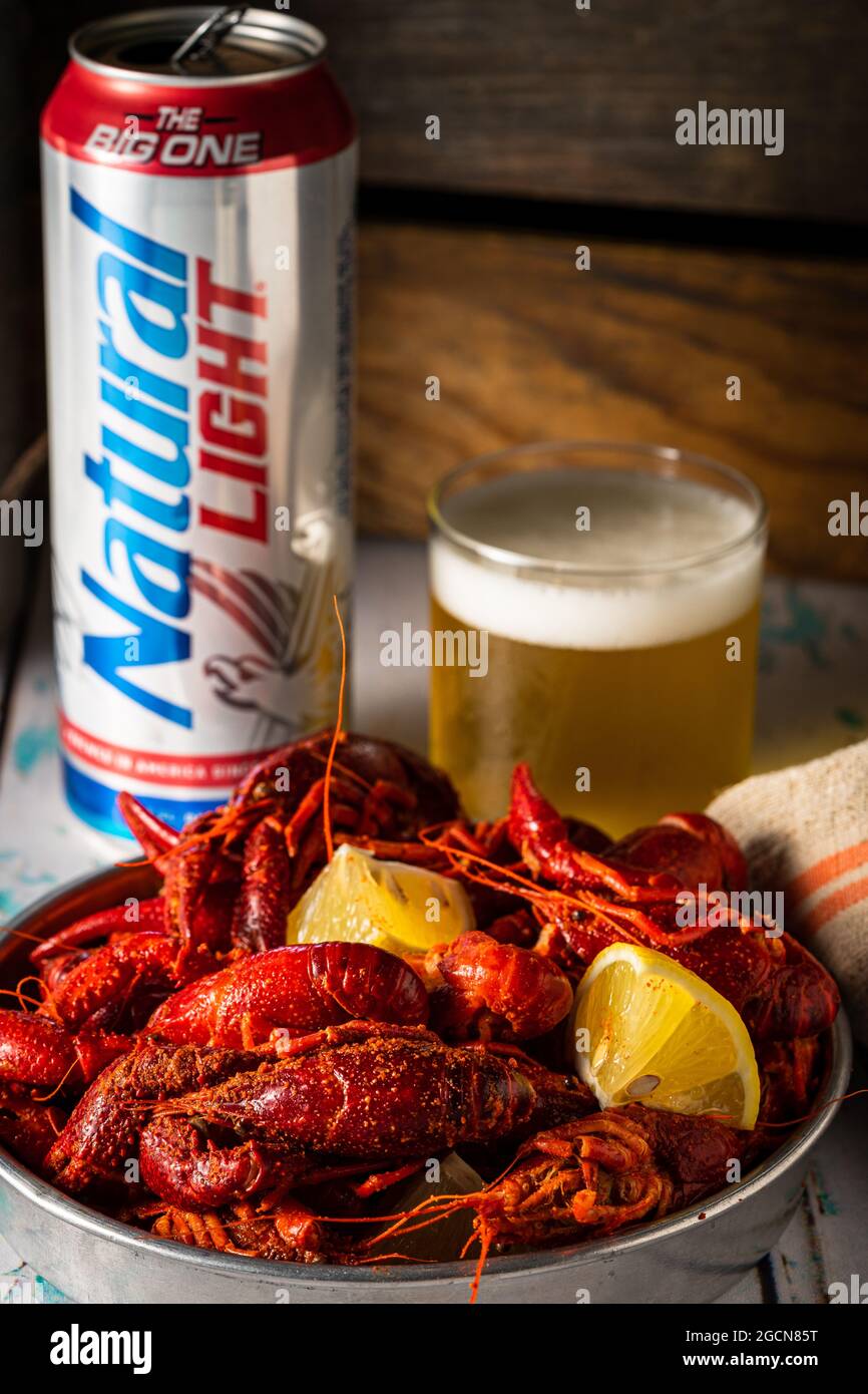 Natural Light beer with steamed crawfish and grilled corn Stock Photo ...