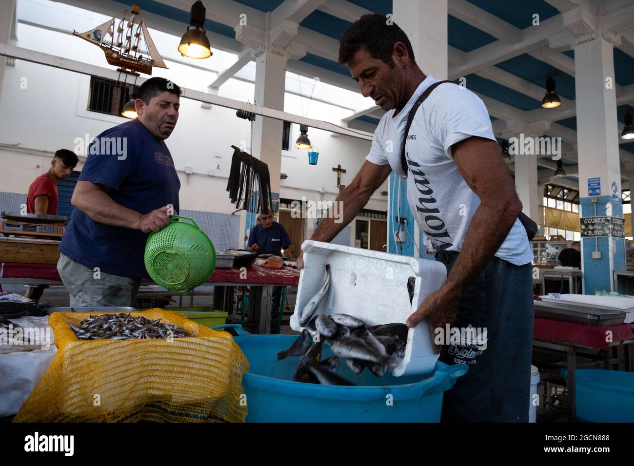 Riposto, Sicily - 20 July 2021: sellers are waiting for clients in ...