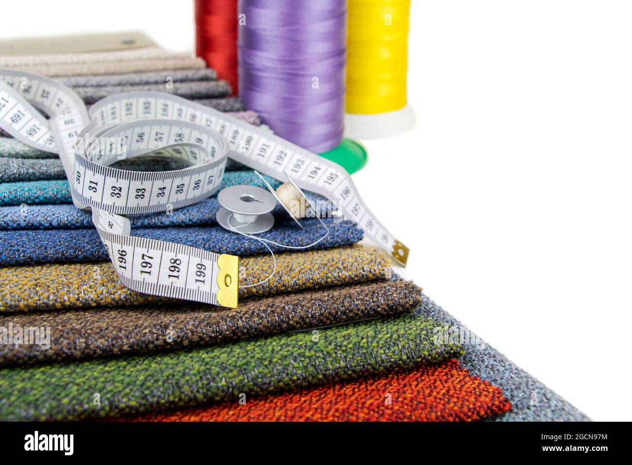 Pieces of fabric and thread. Tailoring, production of clothing and ...