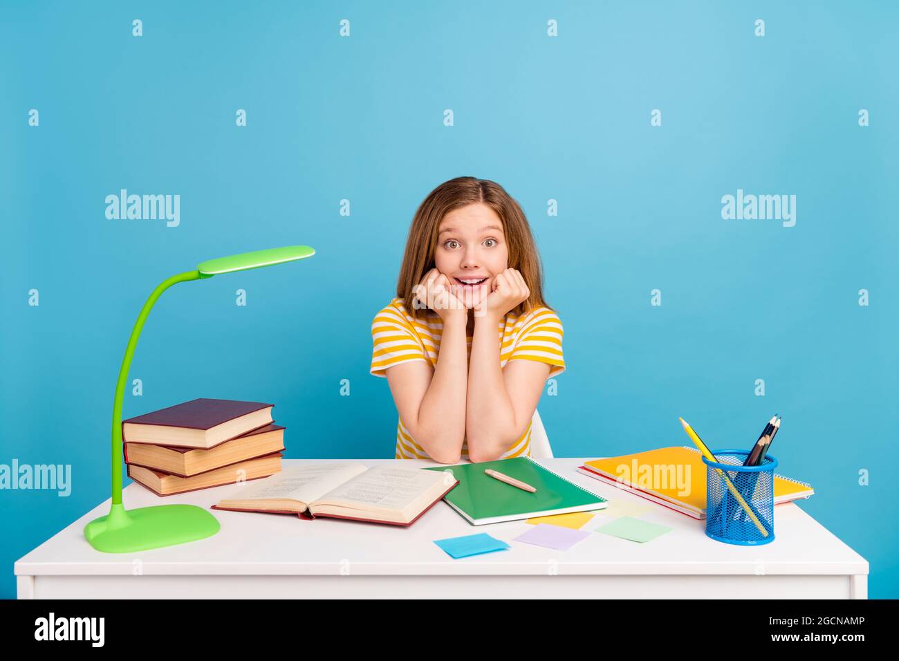 Photo of excited astonished schoolkid hands on cheeks impressed face ...