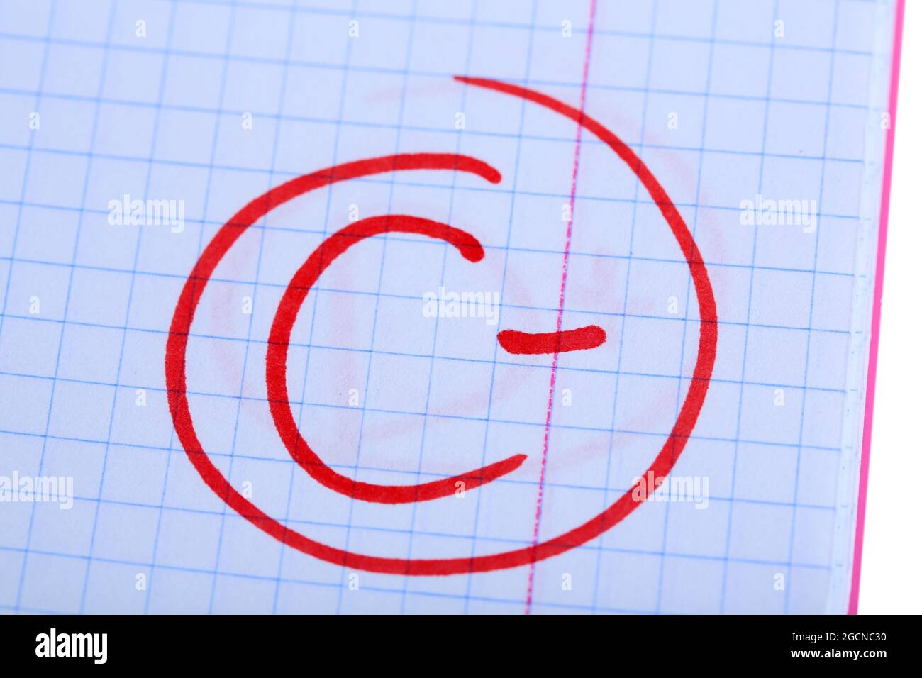 Grade C- written on an exam paper Stock Photo - Alamy