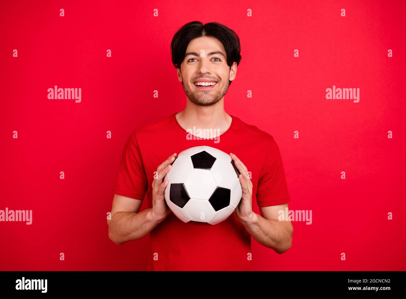 Photo of young man happy positive smile hold soccer ball sportsman ...