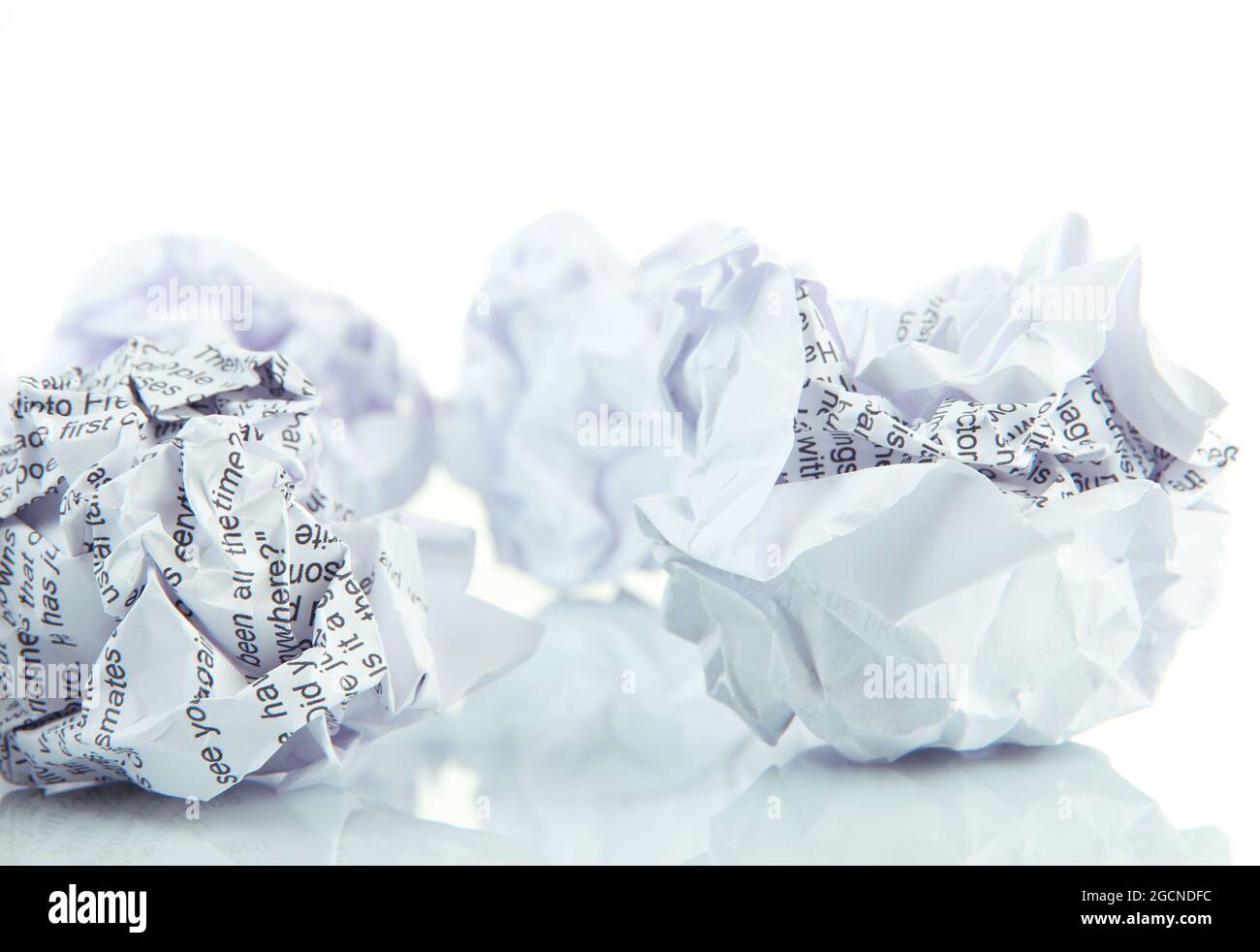 Crumpled paper balls isolated on white Stock Photo - Alamy