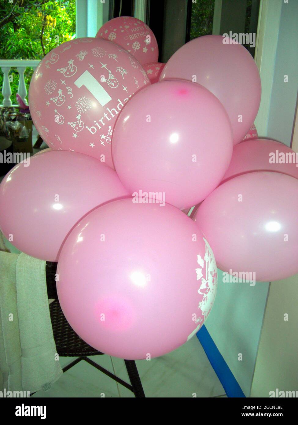 Pink balloons for a children birthday party Stock Photo - Alamy