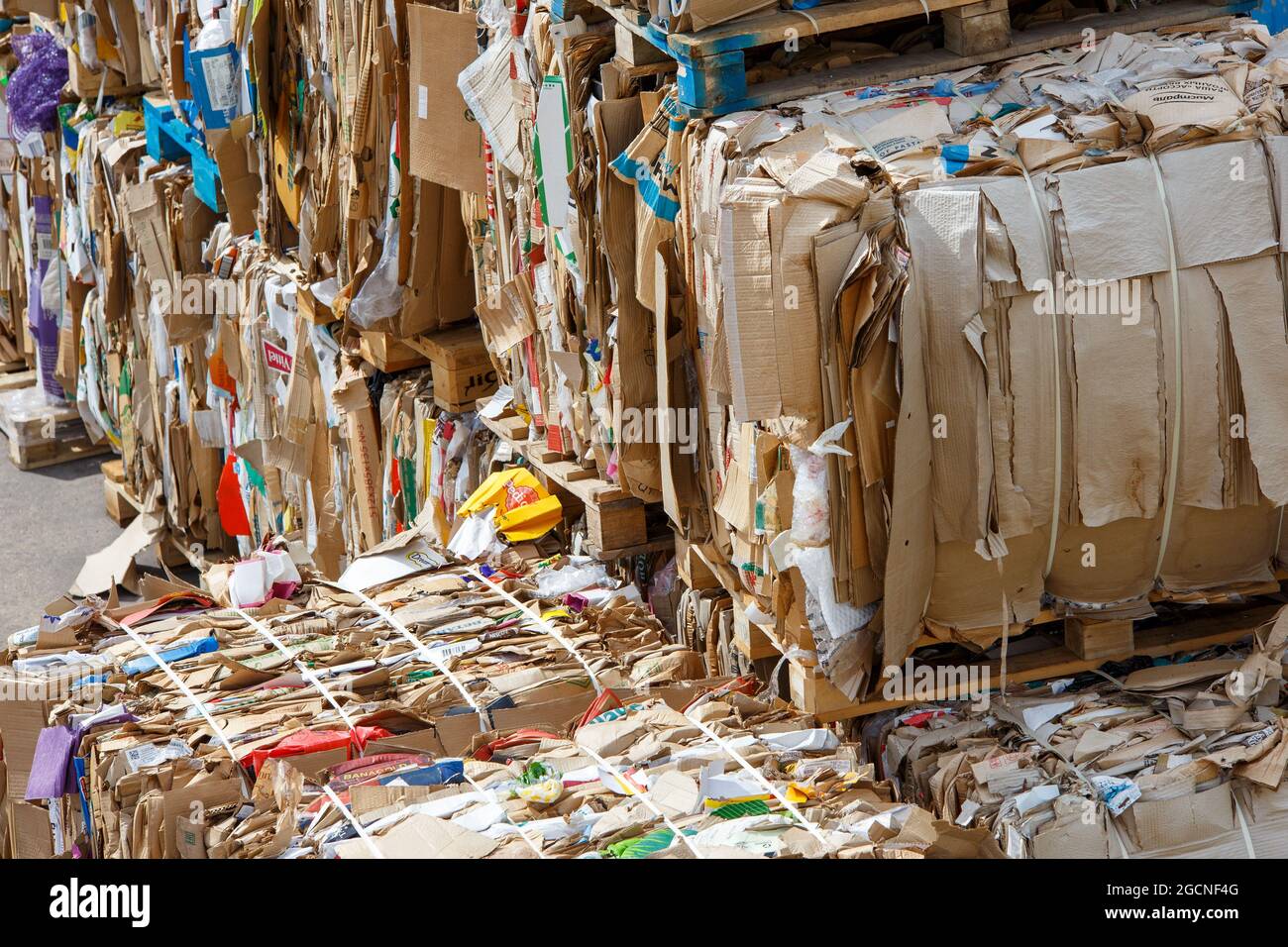 Tula, Russia - August 3, 2021: Crushed and compressed used cardboard ...
