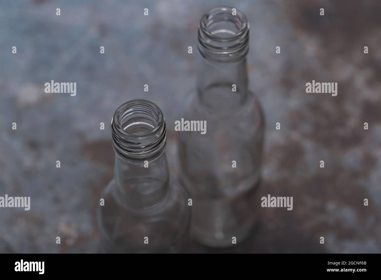 The two empty glass bottles Stock Photo - Alamy
