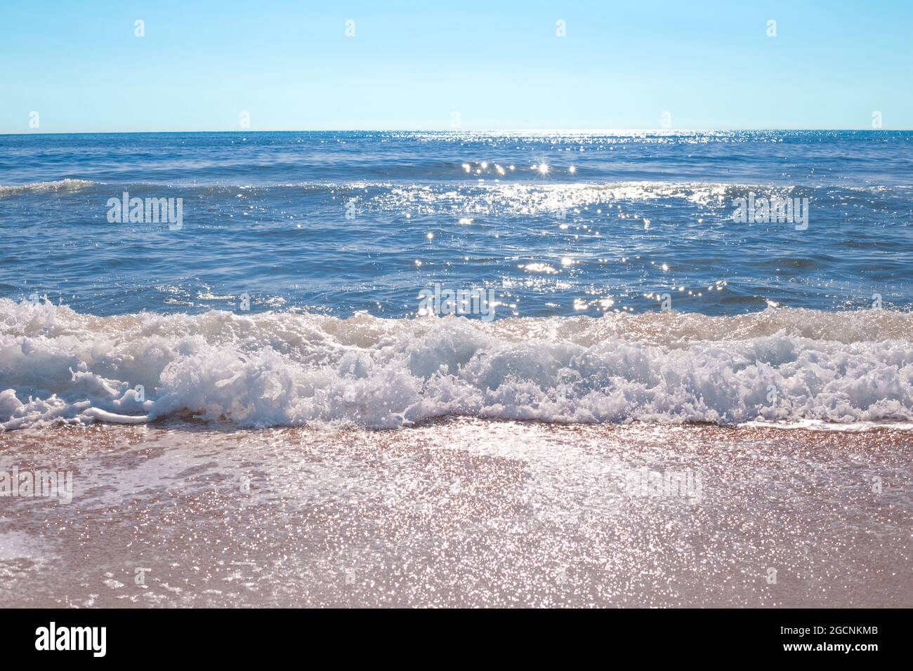Beautiful sea wave with sparkling rays of the bright sun, wallpaper on ...