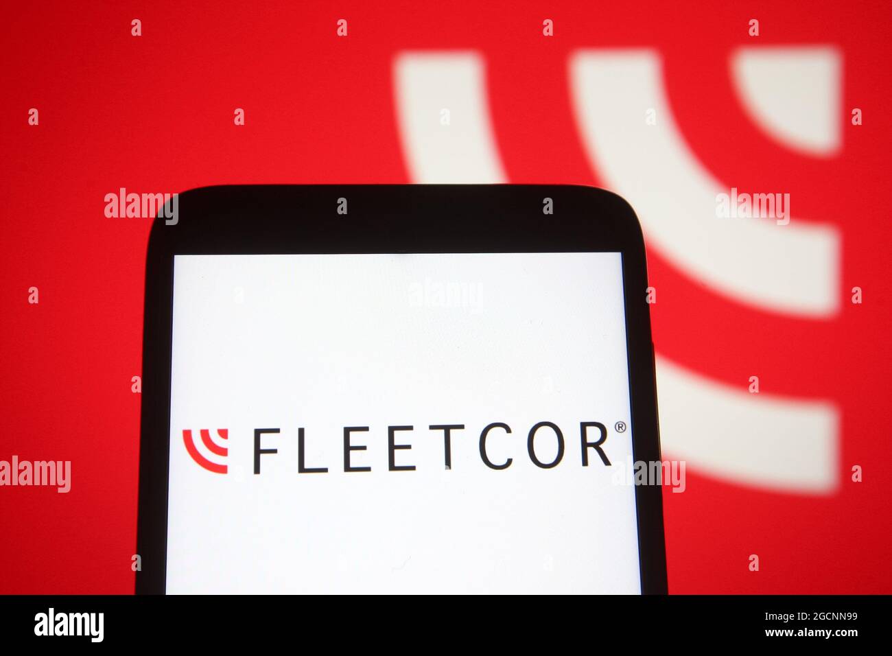 In this photo illustration a FleetCor Technologies logo is seen on a ...