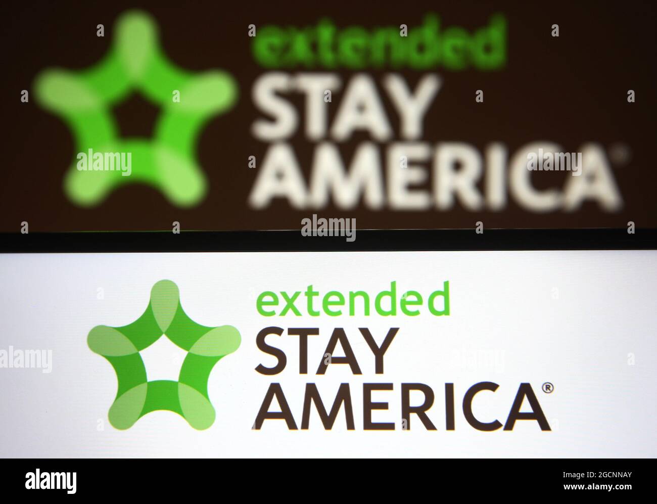 In this photo illustration an Extended Stay America logo of a hotel ...