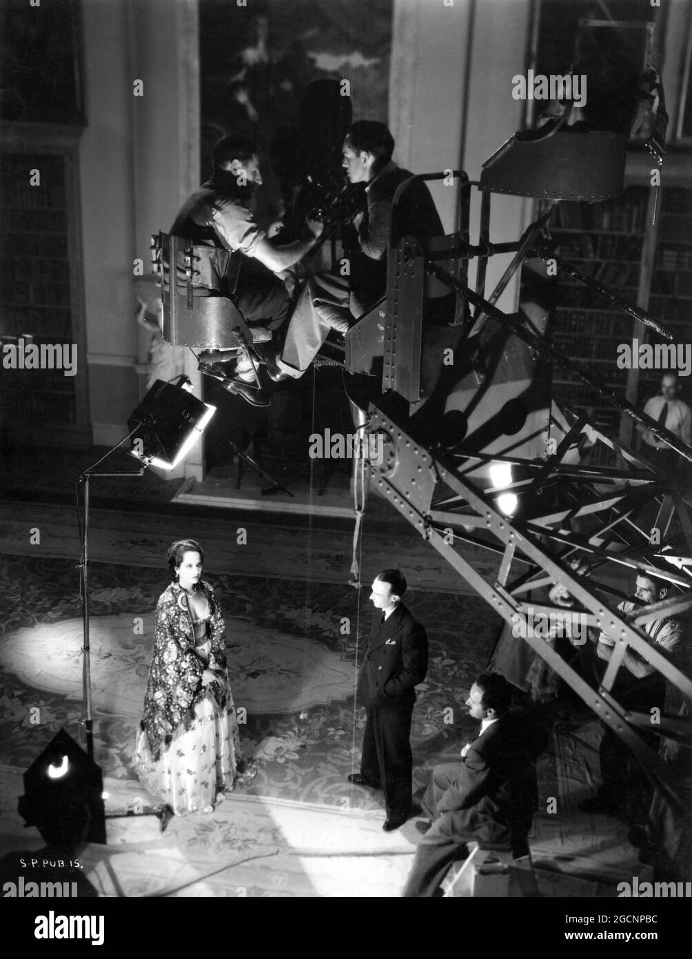 MERLE OBERON Director HAROLD YOUNG and Cinematographer HAROLD ROSSON on ...