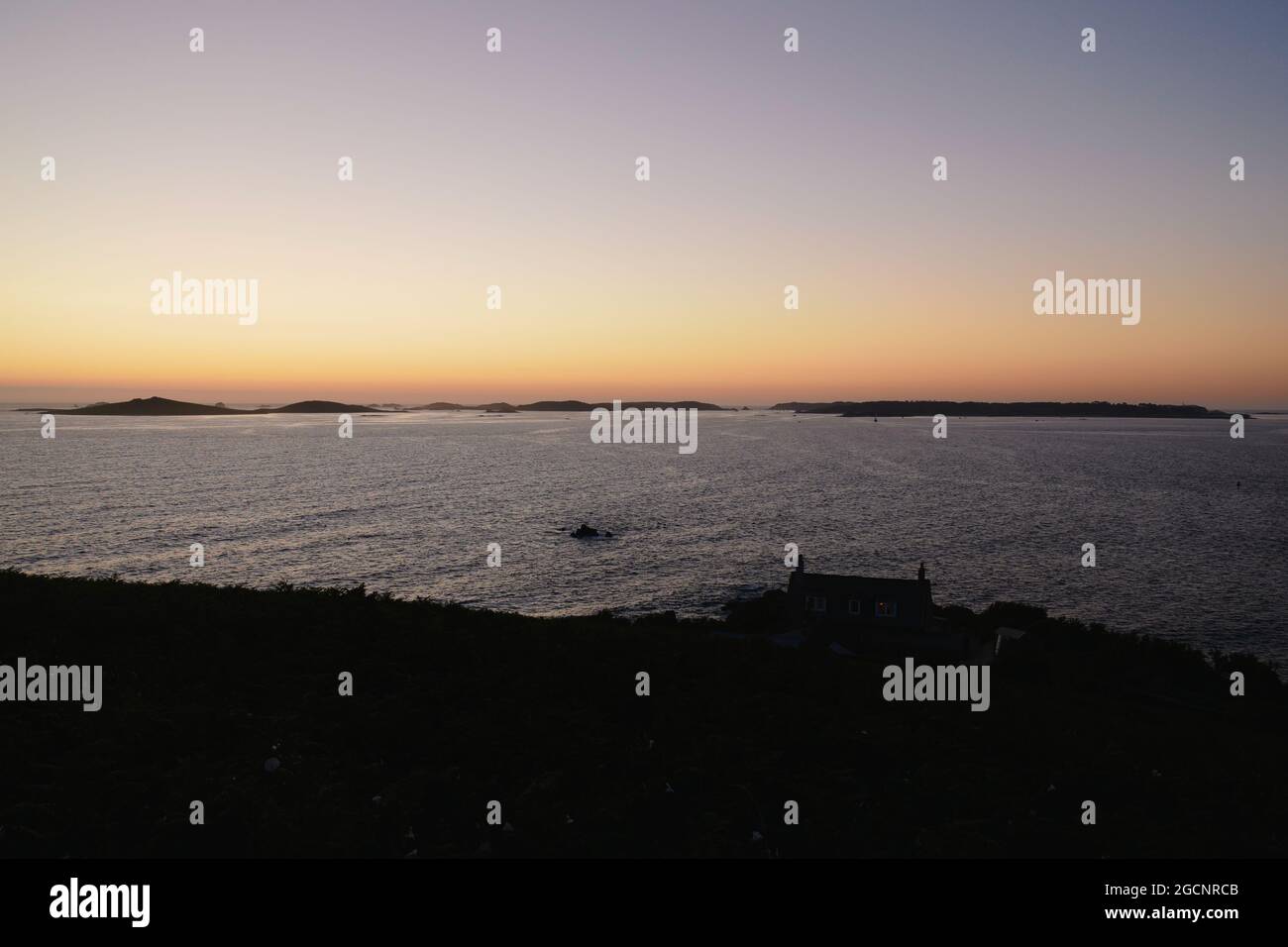 Sunset view of St Agnes from Garrison Hill, Hugh Town, St Mary's island ...