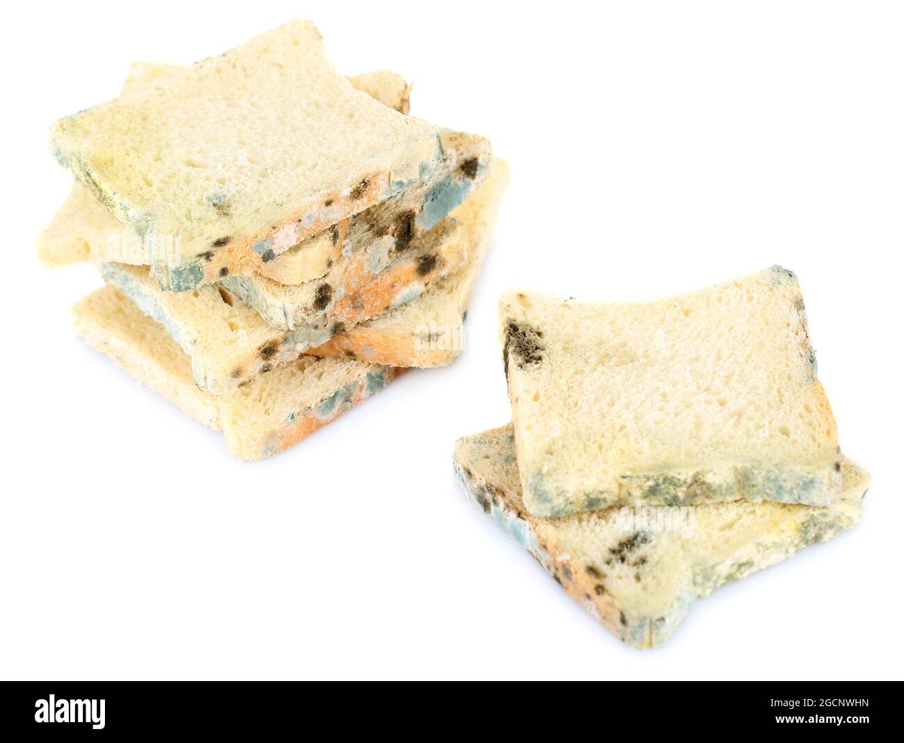 Mouldy bread, isolated on white Stock Photo - Alamy
