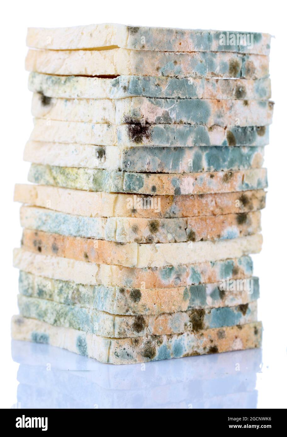 Mouldy bread, isolated on white Stock Photo - Alamy