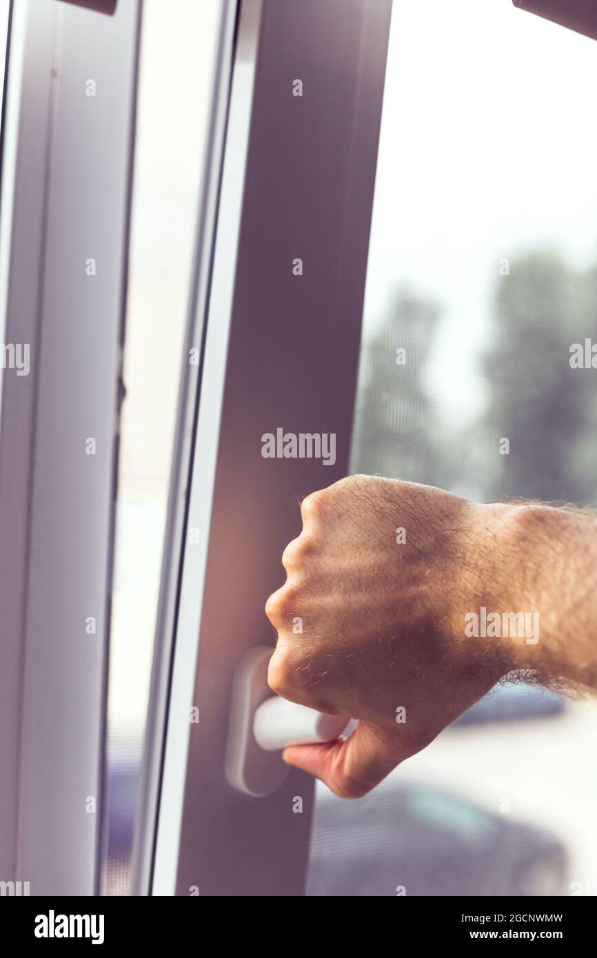 Open PVC window at ventilation position Stock Photo - Alamy