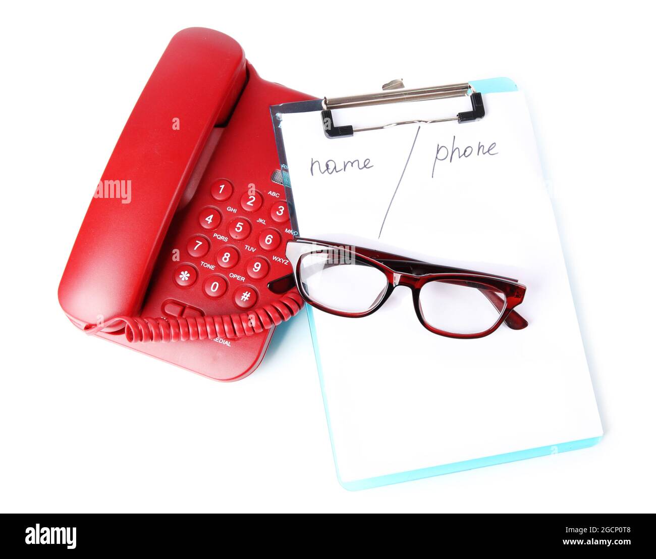 Telephone and notepad and other items, isolated on white Stock Photo ...
