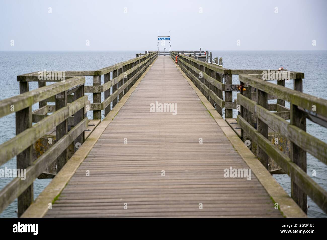 Wooden bridge over the sea Stock Photo - Alamy