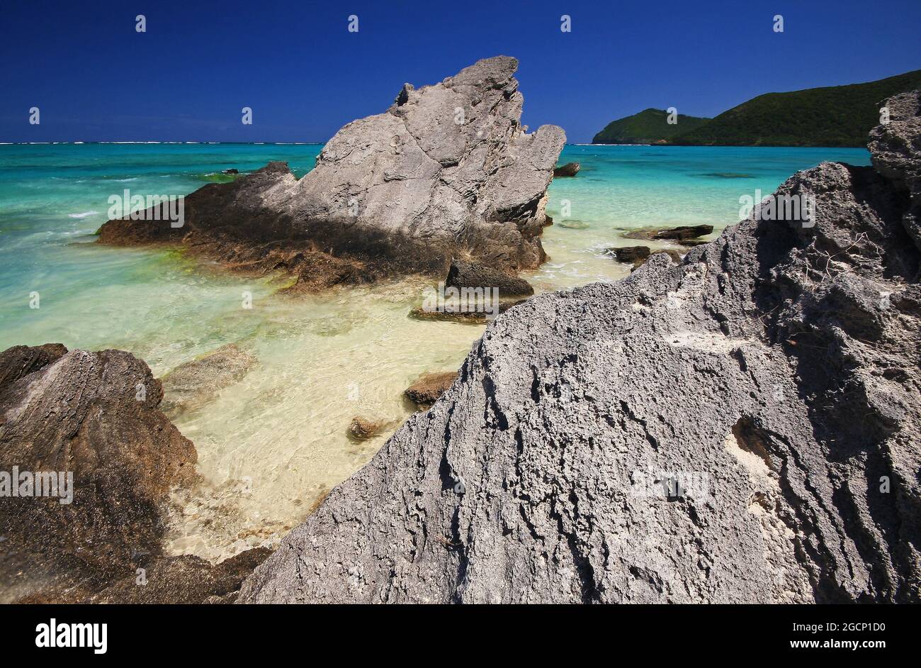 rocks and crystal clear waters on lord howe island Stock Photo - Alamy