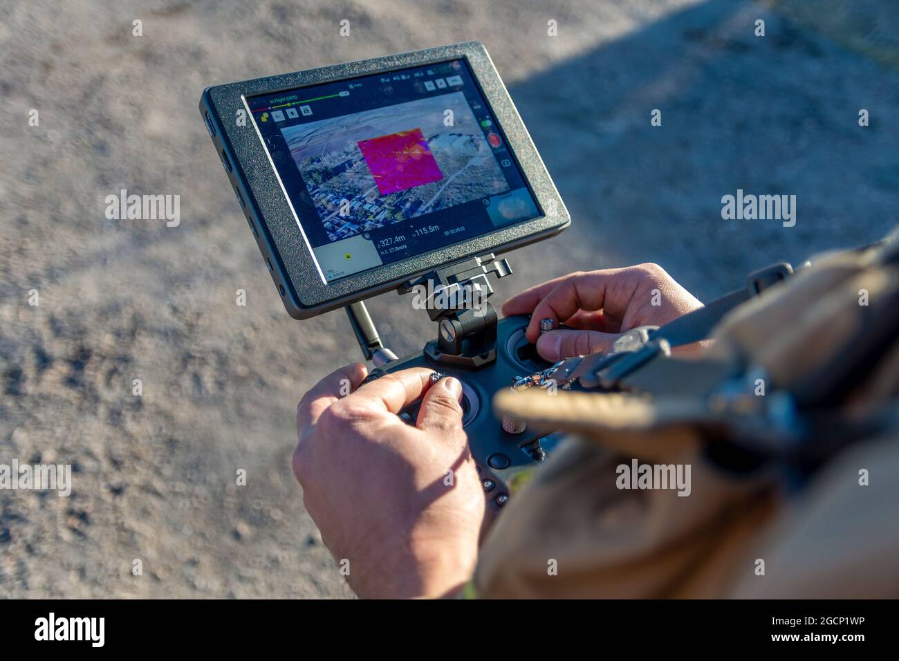 SAN RAFAEL, ARGENTINA - Jul 17, 2021: A firefighter flying drone with a ...