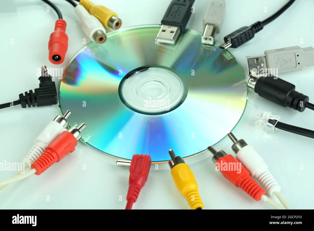 Disk and various connector cables isolated on white Stock Photo - Alamy
