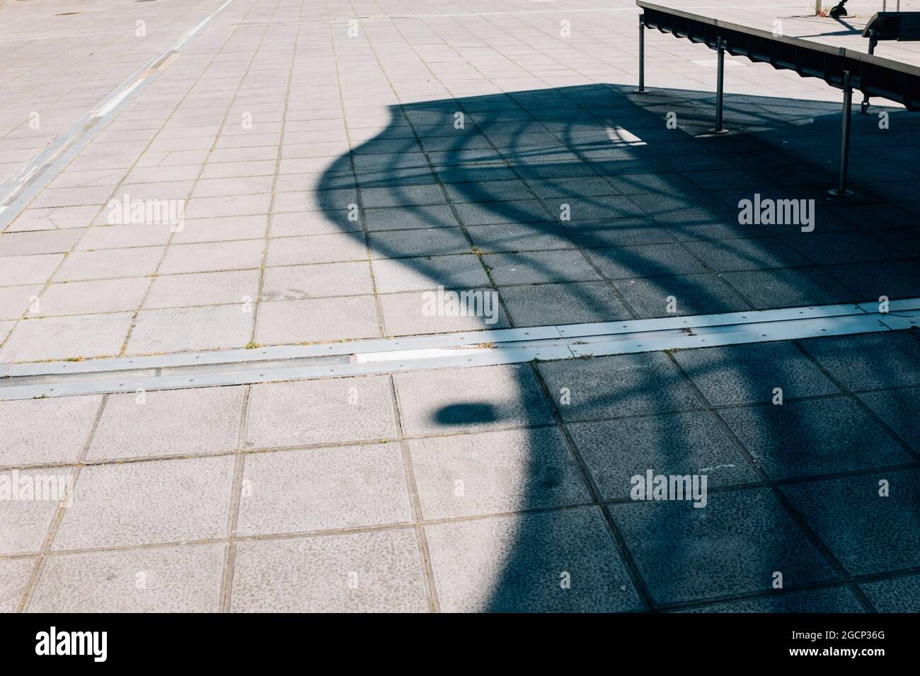 Big shadow on the textured ground Stock Photo - Alamy
