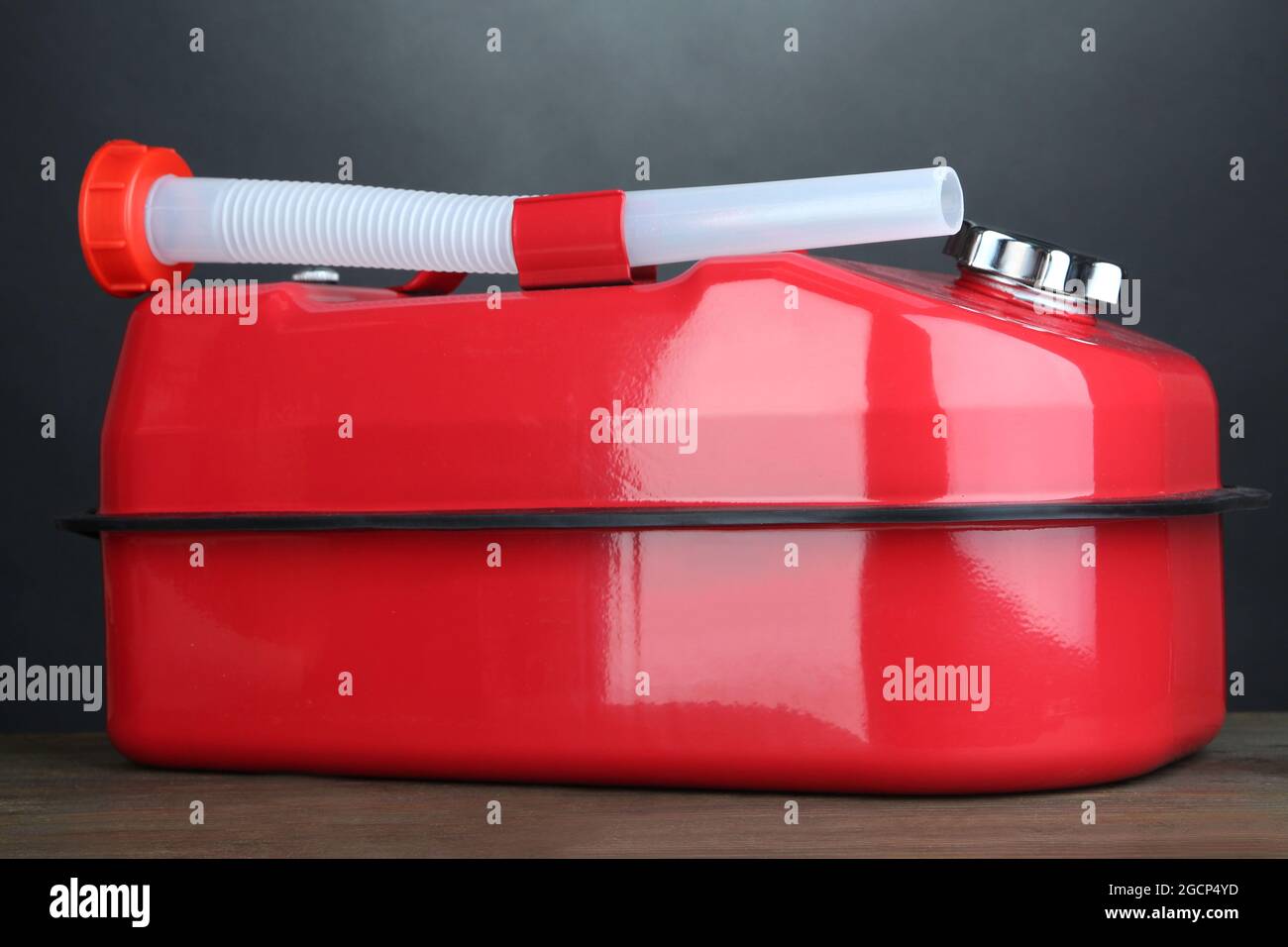 Red diesel canister on grey background Stock Photo - Alamy