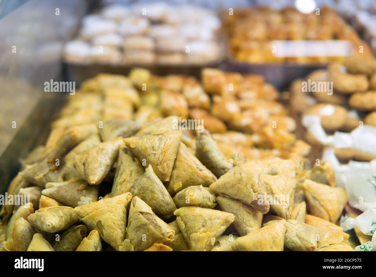 Homemade Moroccan pastries displayed in a traditional food marke Stock ...