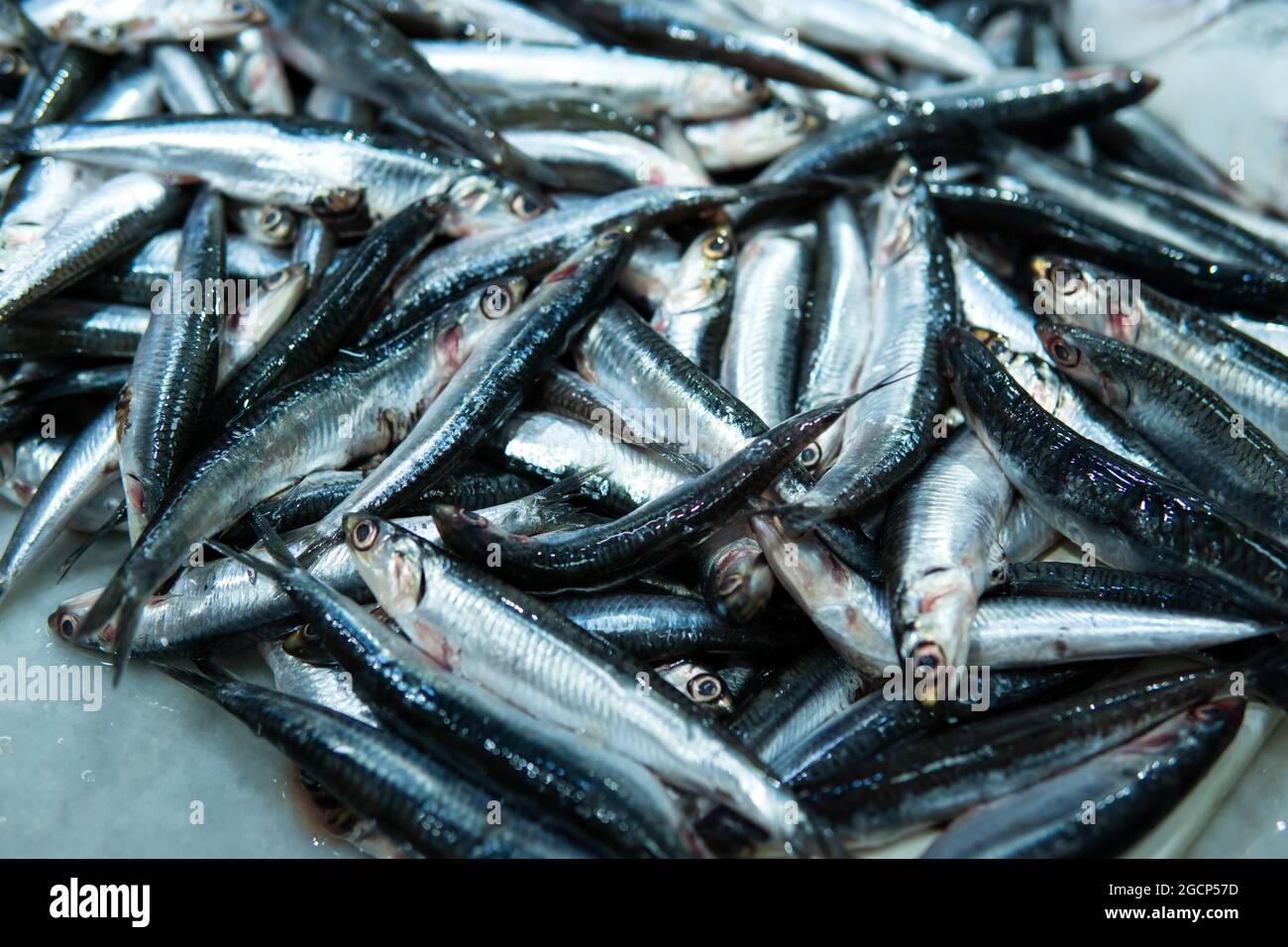 Fresh fish displayed in a traditional food market, a pile of anc Stock ...