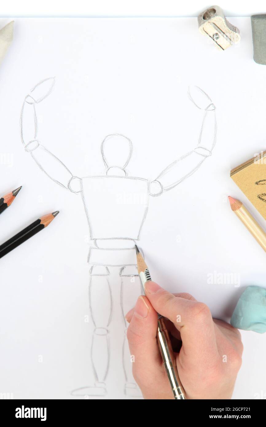 Hand draws a sketch with professional art materials Stock Photo - Alamy