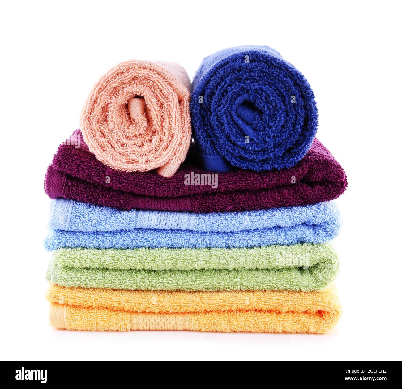 Colorful towels isolated on white Stock Photo - Alamy