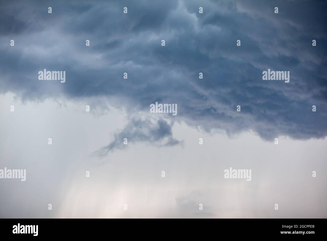 Dramatic sky with grey clouds over the city before the storm. Weather ...