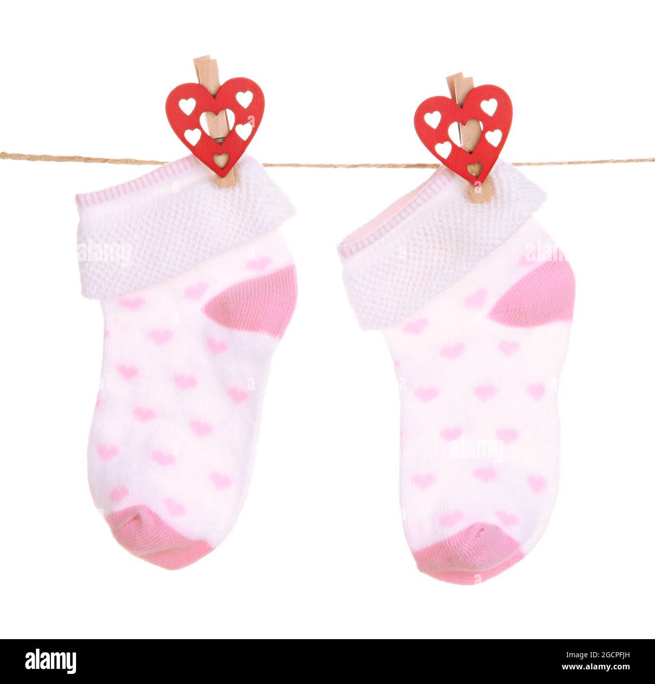 Socks hanging on clothesline isolated on white Stock Photo - Alamy