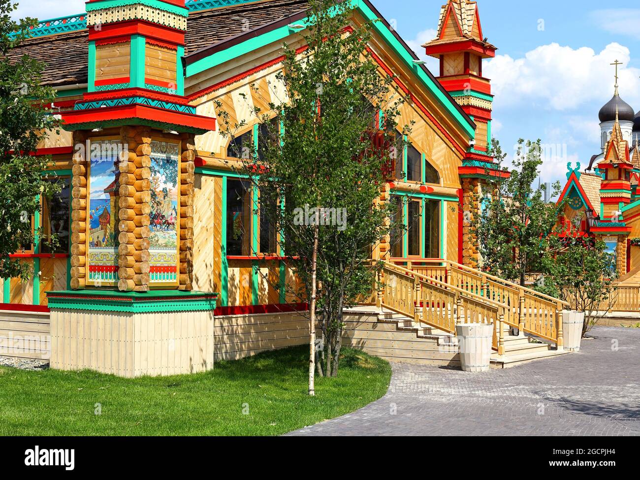 Front porch of a wooden Russian tower building with painted walls and ...