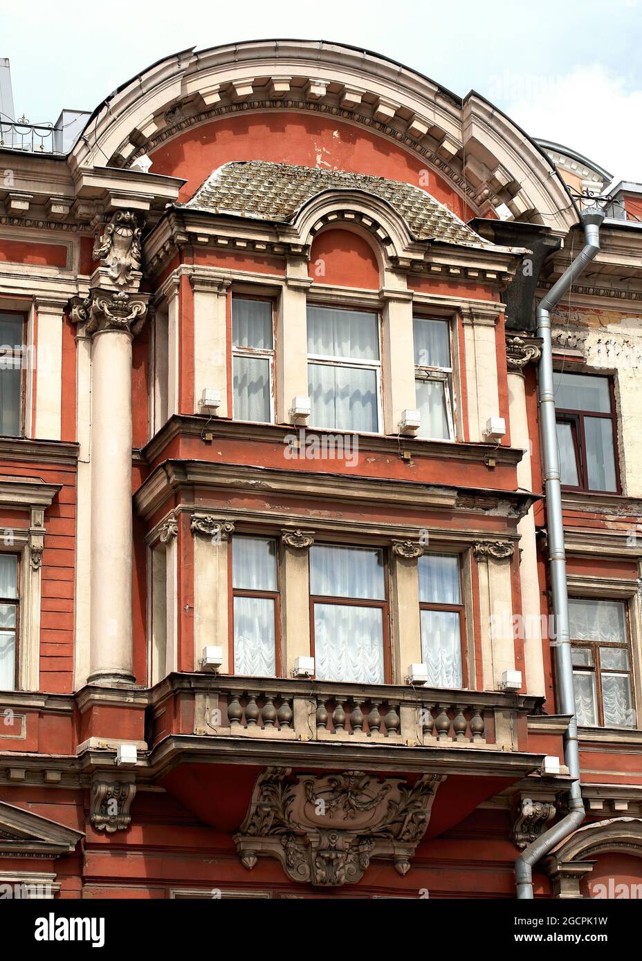Abandoned vintage old fashioned building with baroque stucco pediment ...