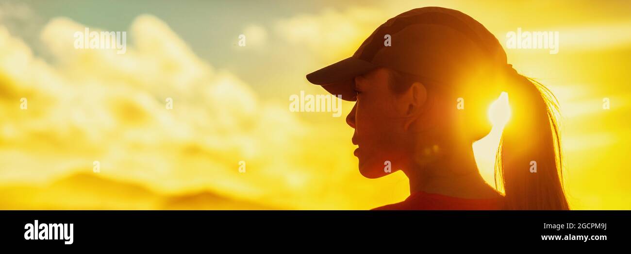 Healthy active lifestyle woman outside looking away to the side with ...